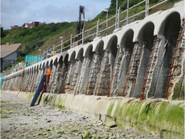 Reinforced concrete jacketing