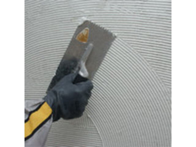Tiling on gypsum plaster