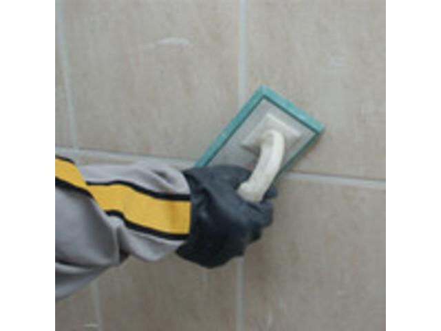Tiling on gypsum plaster
